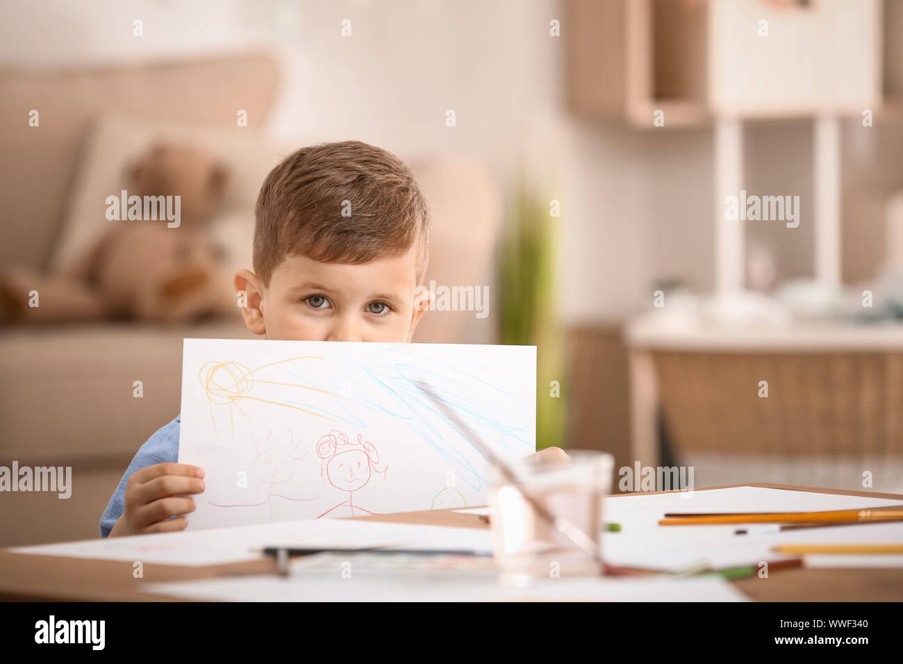 Cute little boy drawing at home Stock Photo - Alamy
