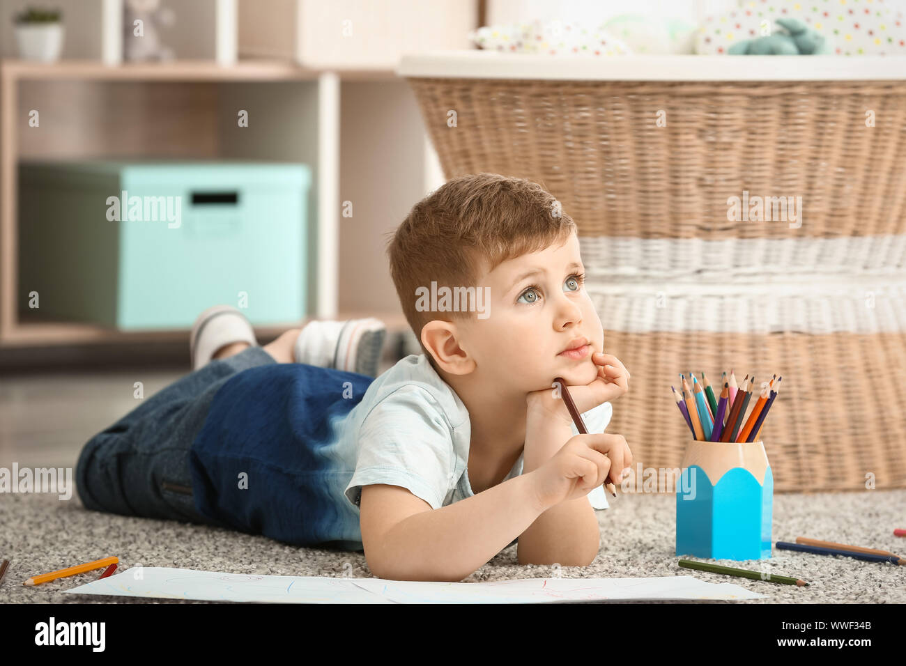 Cute little boy drawing at home Stock Photo - Alamy