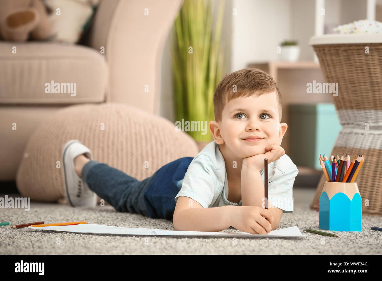 Cute little boy drawing at home Stock Photo - Alamy