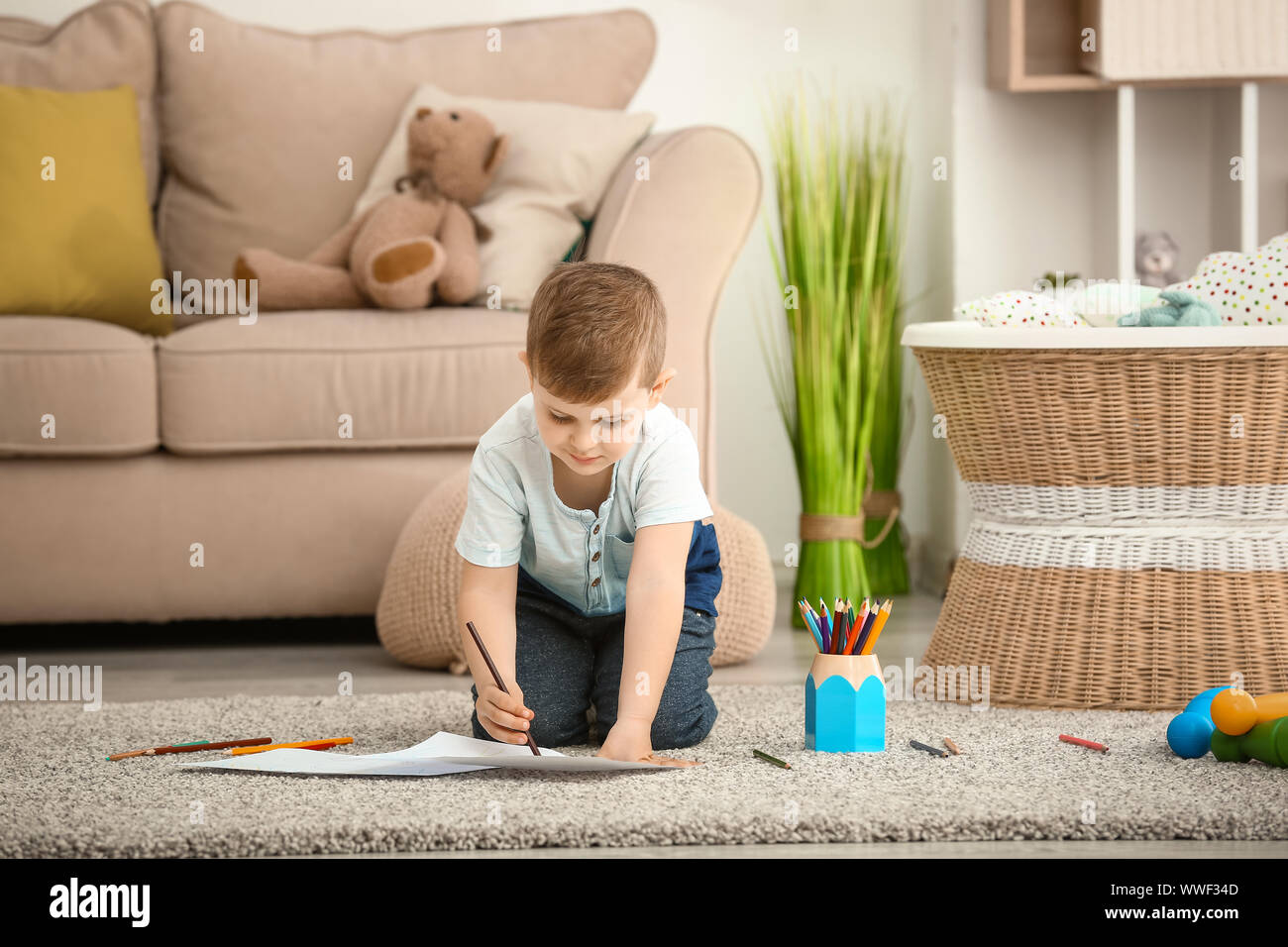 Cute little boy drawing at home Stock Photo - Alamy