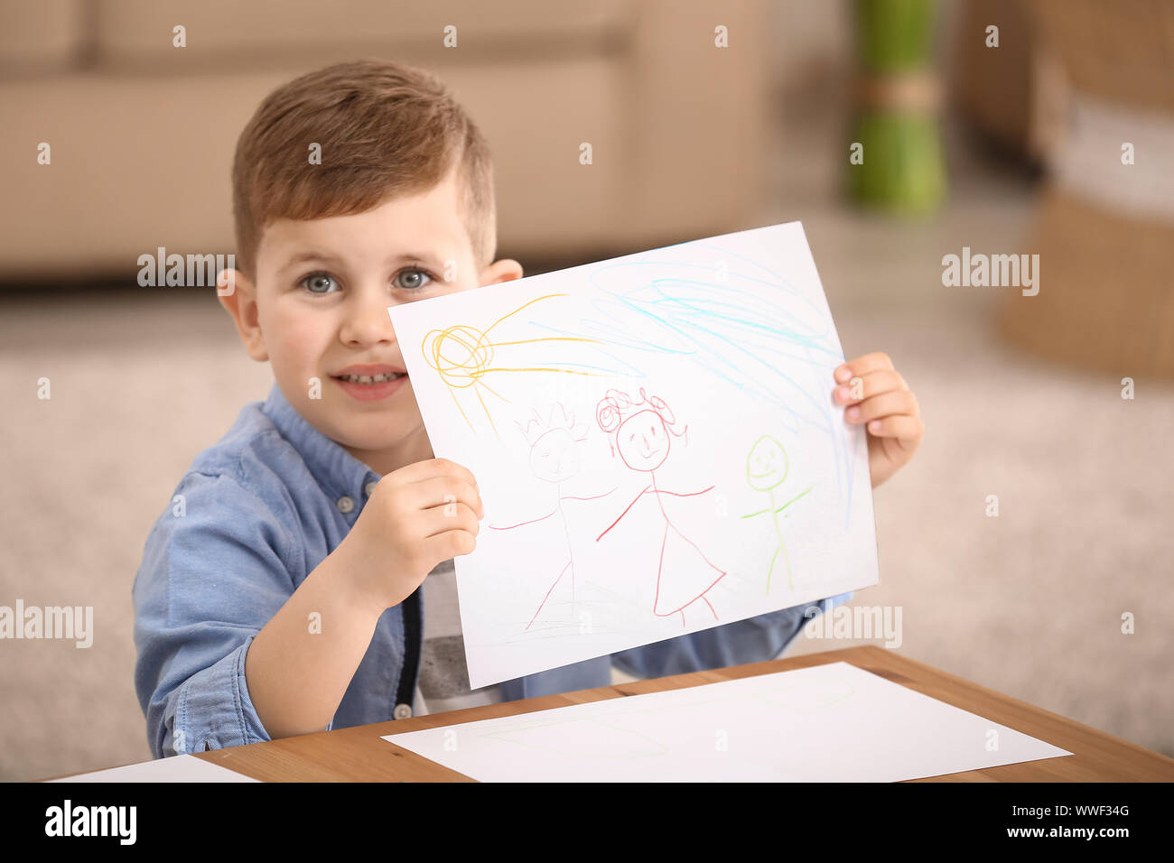 Cute little boy drawing at home Stock Photo - Alamy