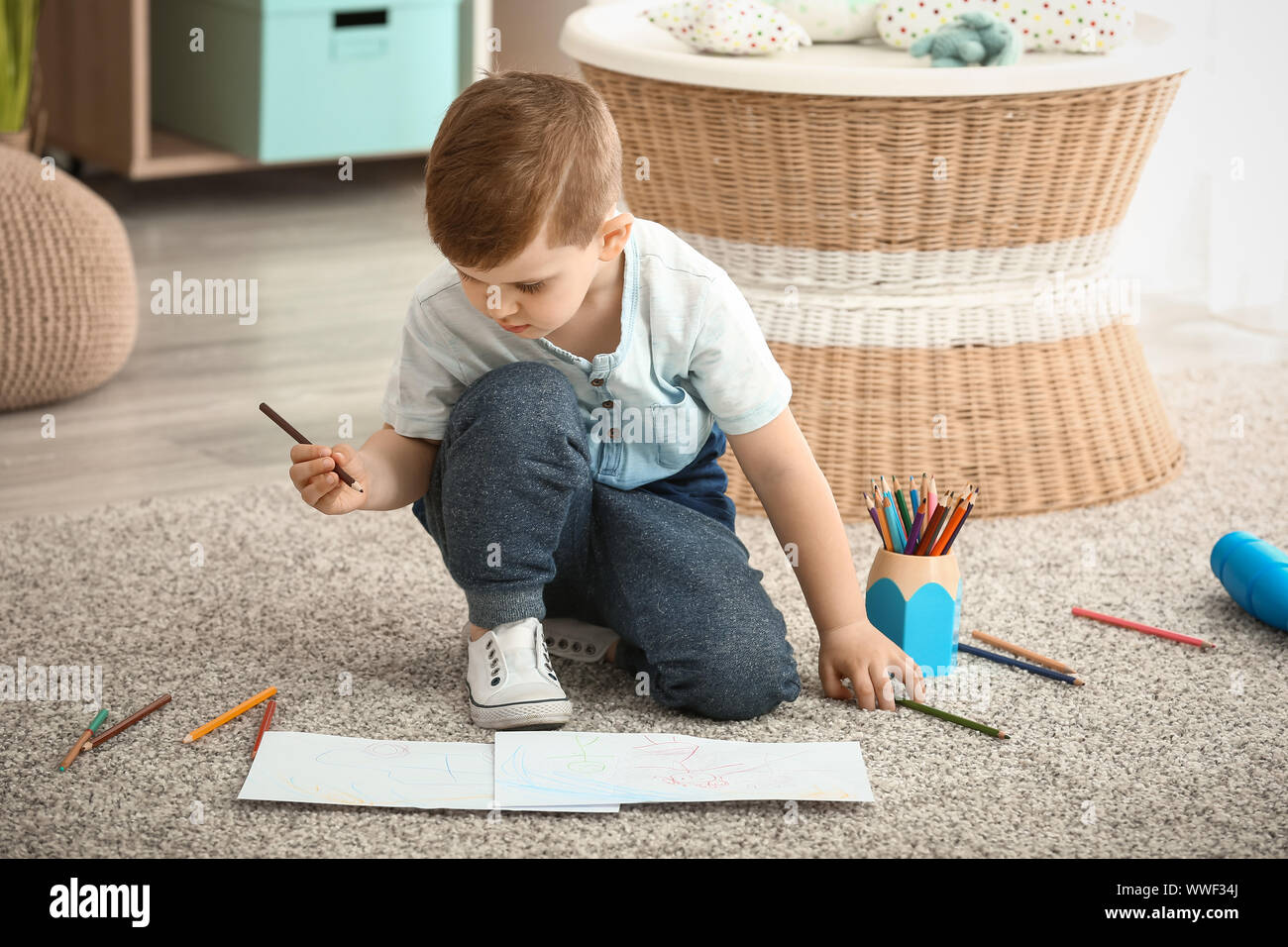 Cute little boy drawing at home Stock Photo - Alamy