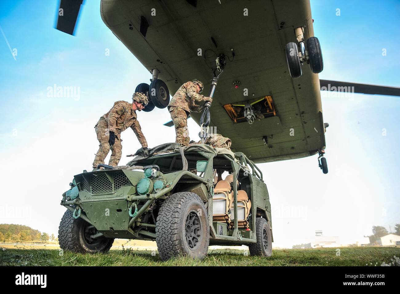 U.S. Army paratroopers assigned to the 173rd Airborne Brigade sling ...