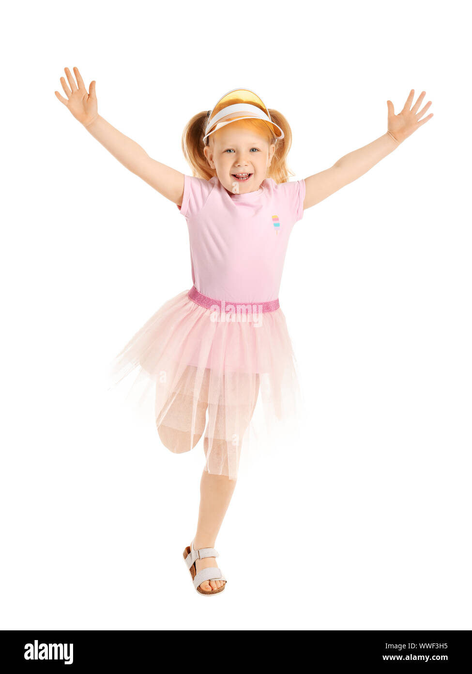 Portrait of jumping little girl on white background Stock Photo - Alamy