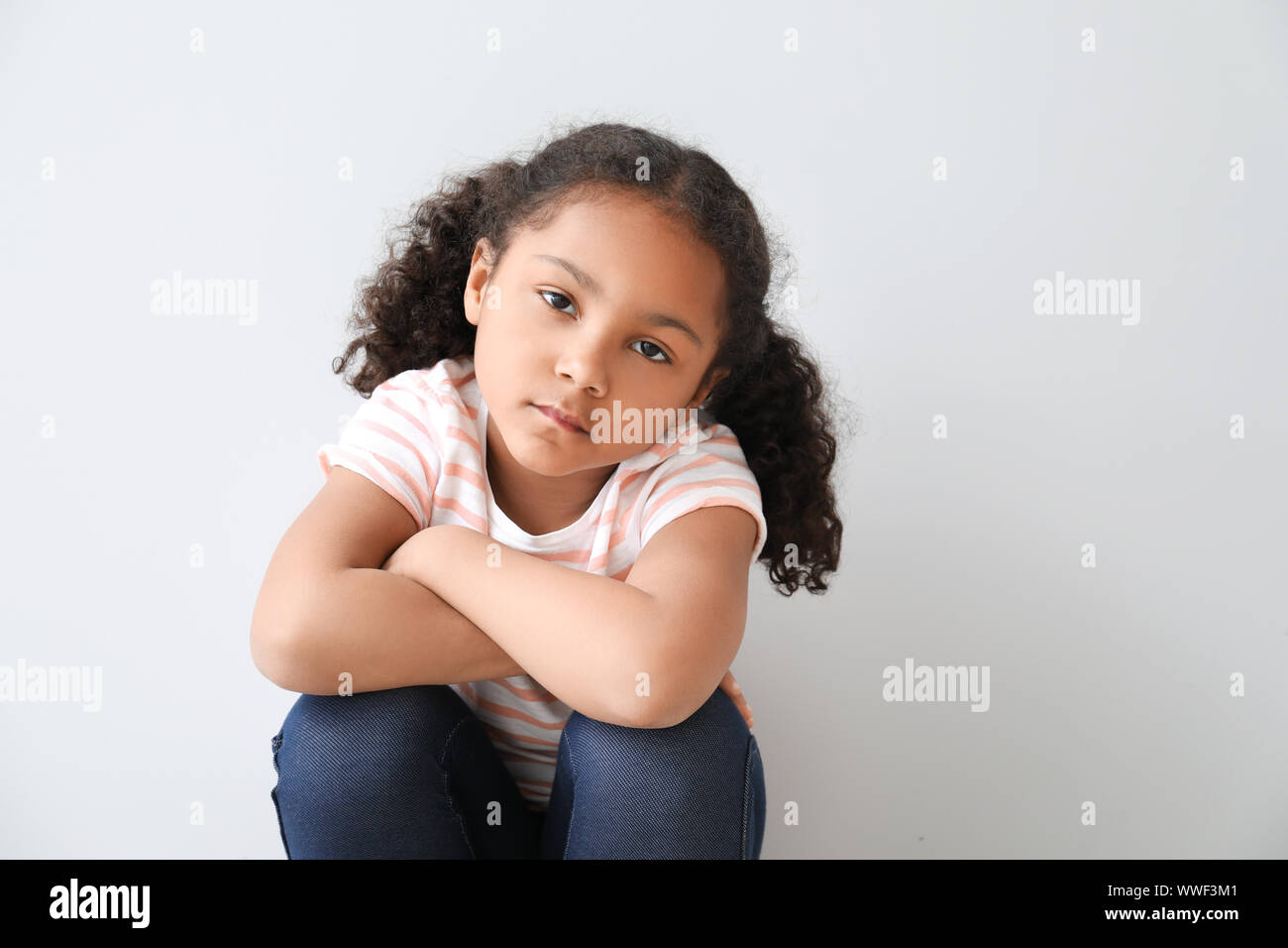 Portrait sad little african american girl hi-res stock photography and images - Alamy