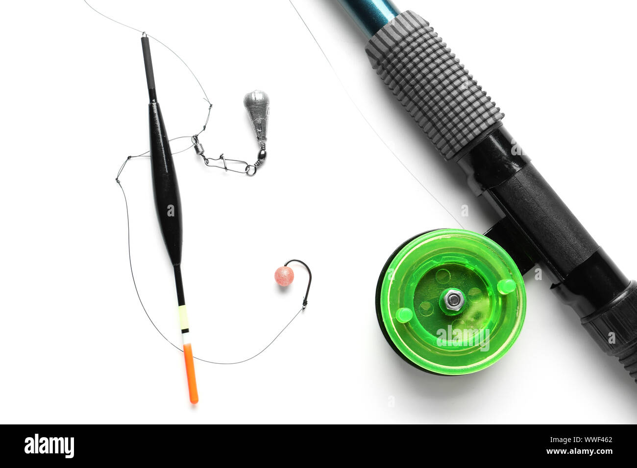 Fishing tackle and tools on white background Stock Photo - Alamy