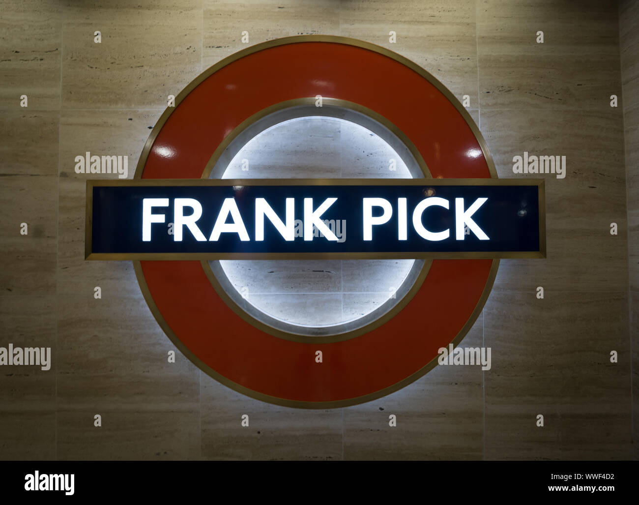 Close up of London underground roundel with the name Frank Pick in ...