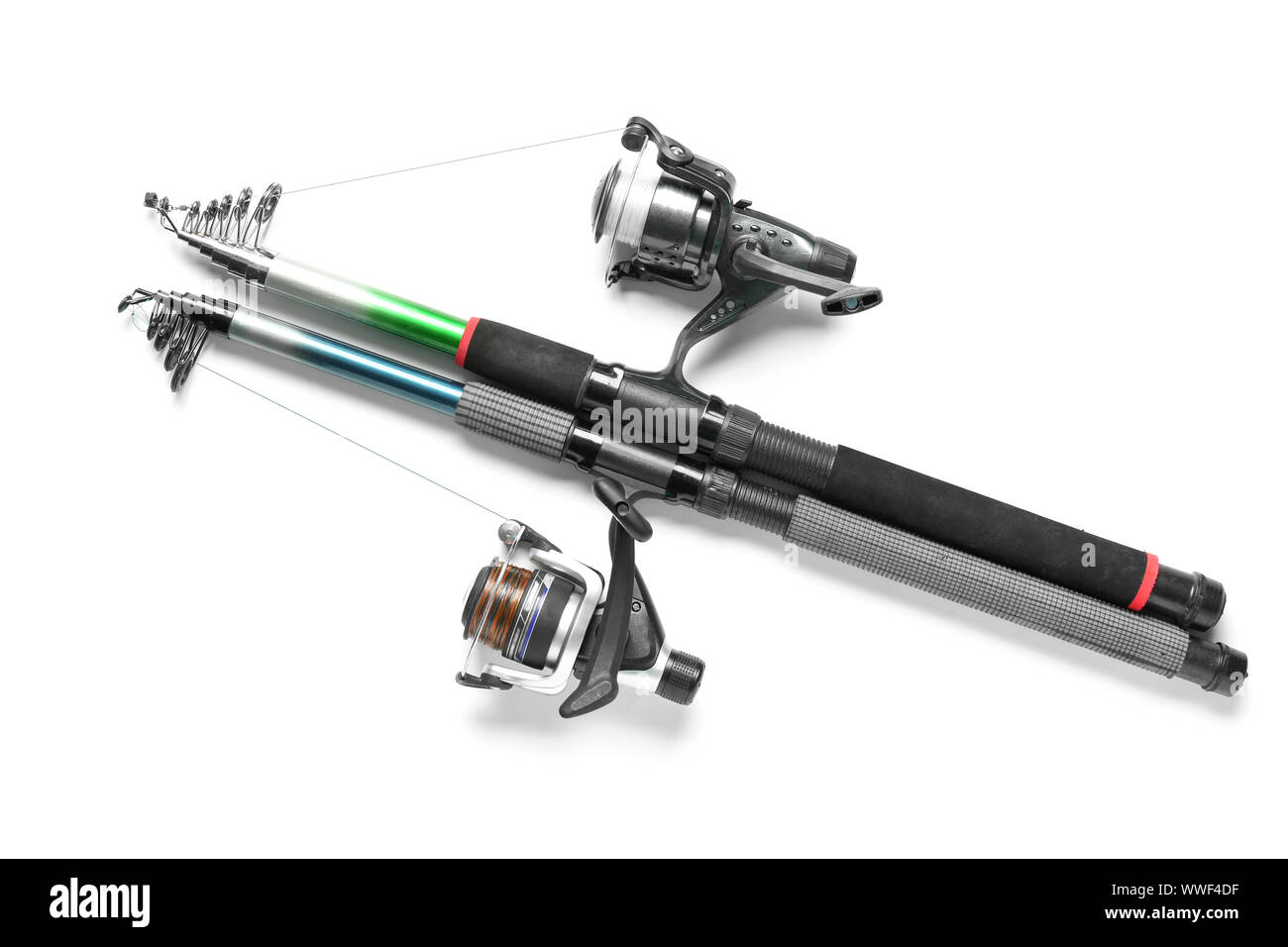 Modern fishing rods on white background Stock Photo - Alamy