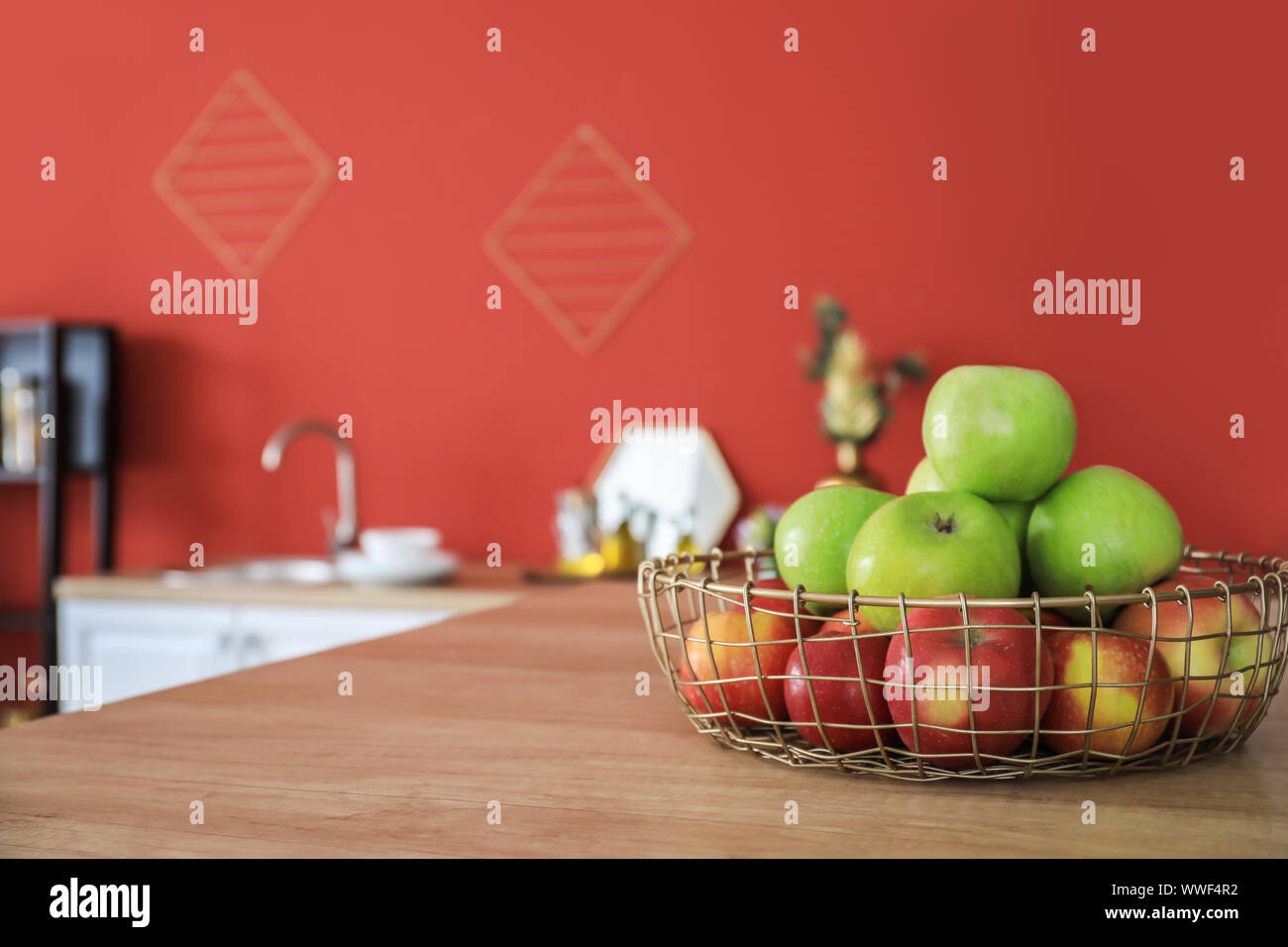 Fresh apples on counter in kitchen Stock Photo - Alamy