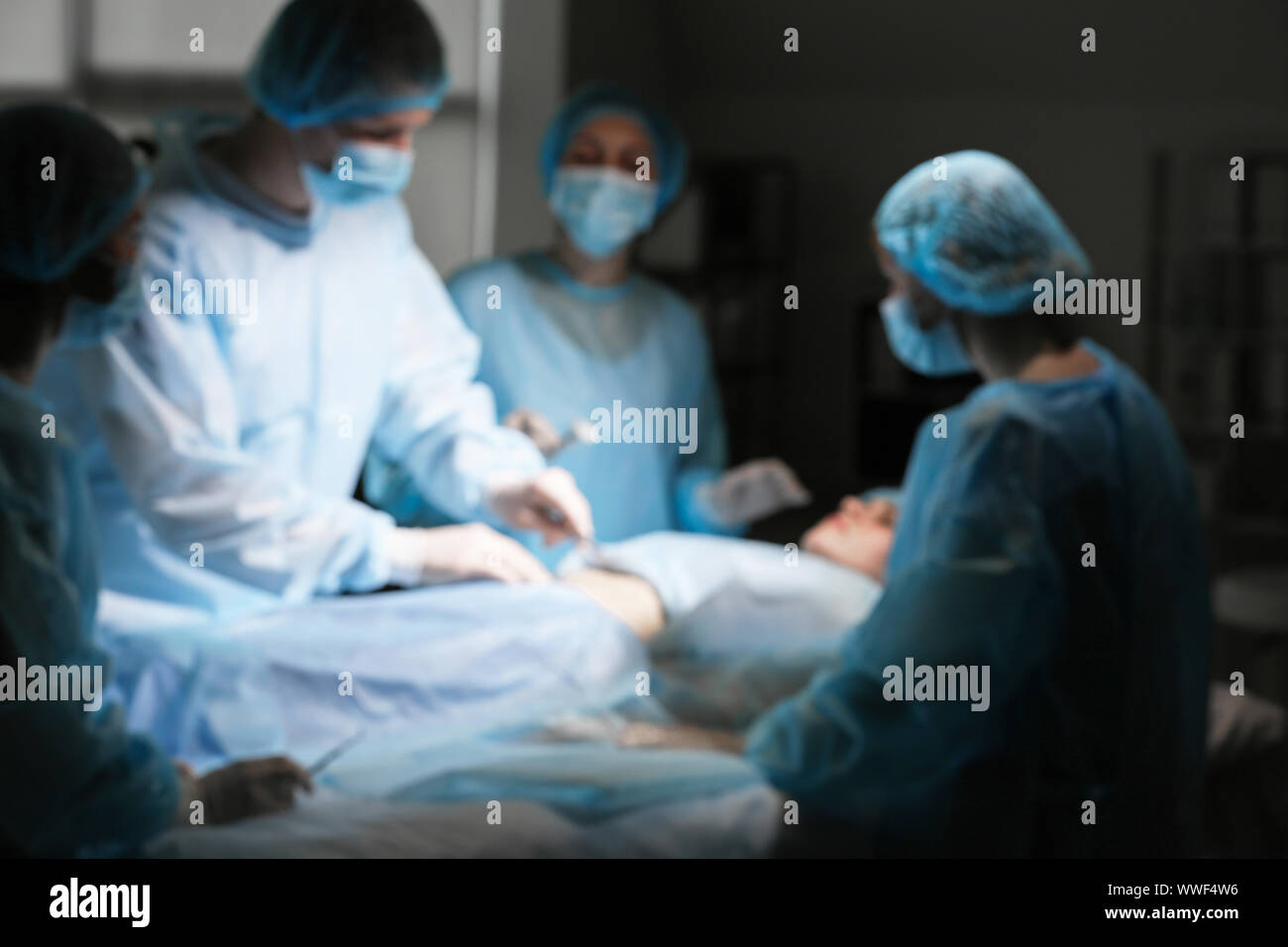 Blurred view of operation in plastic surgery clinic Stock Photo - Alamy