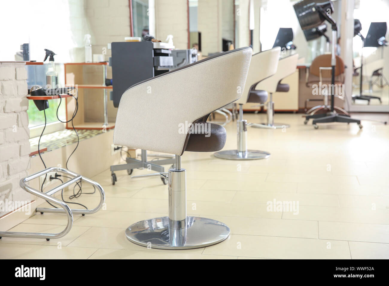 Interior of modern hairdressing salon Stock Photo - Alamy