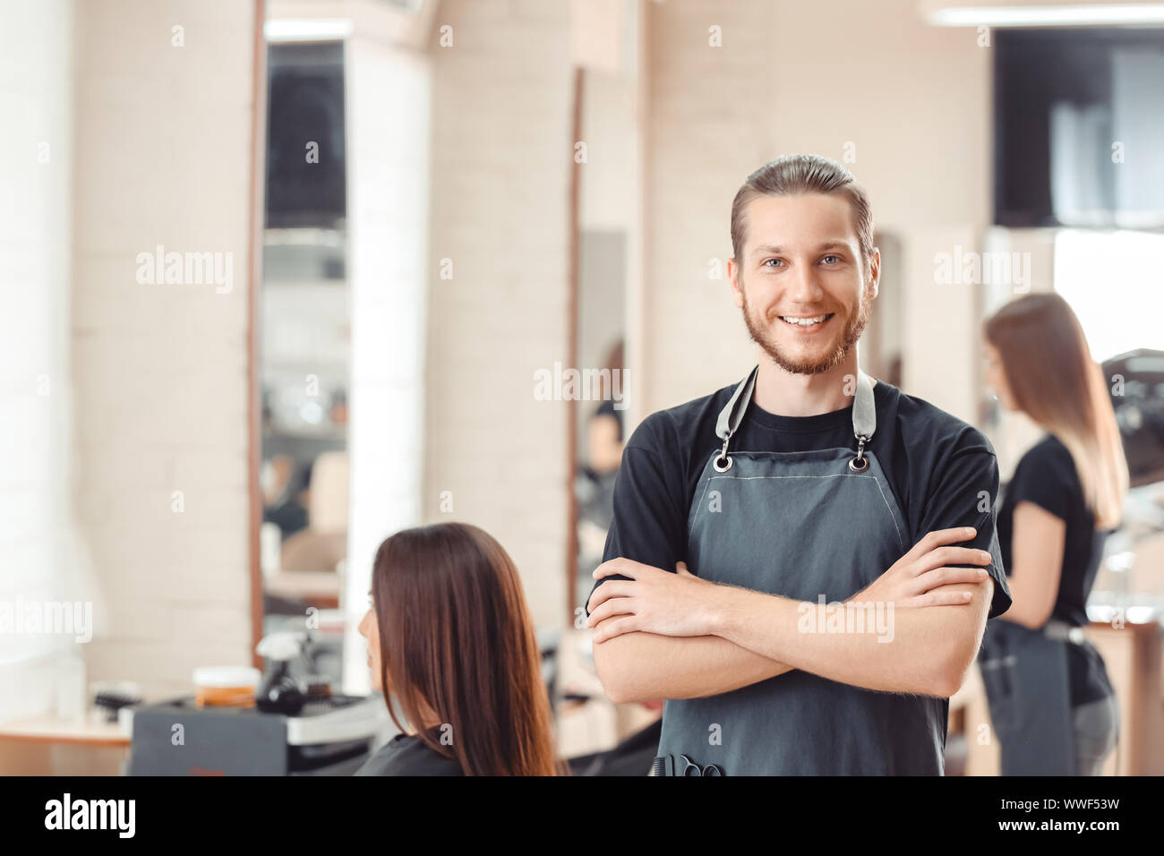 Portrait of male hairdresser in salon Stock Photo - Alamy
