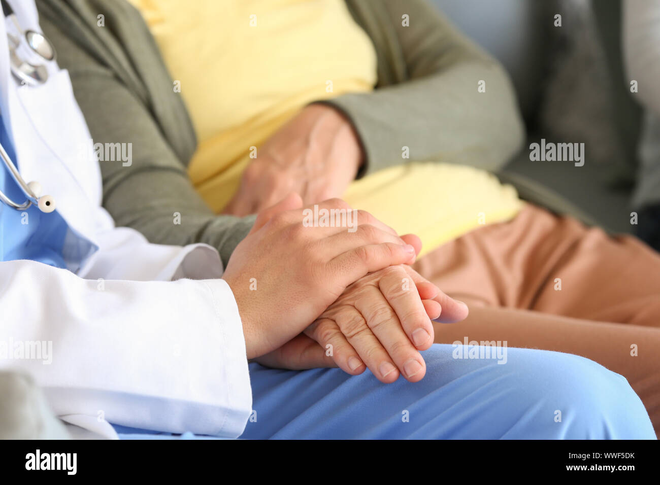 Young man looking after elderly hi-res stock photography and images - Alamy