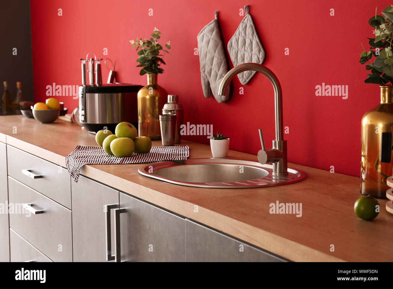 Counter with sink in interior of kitchen Stock Photo - Alamy