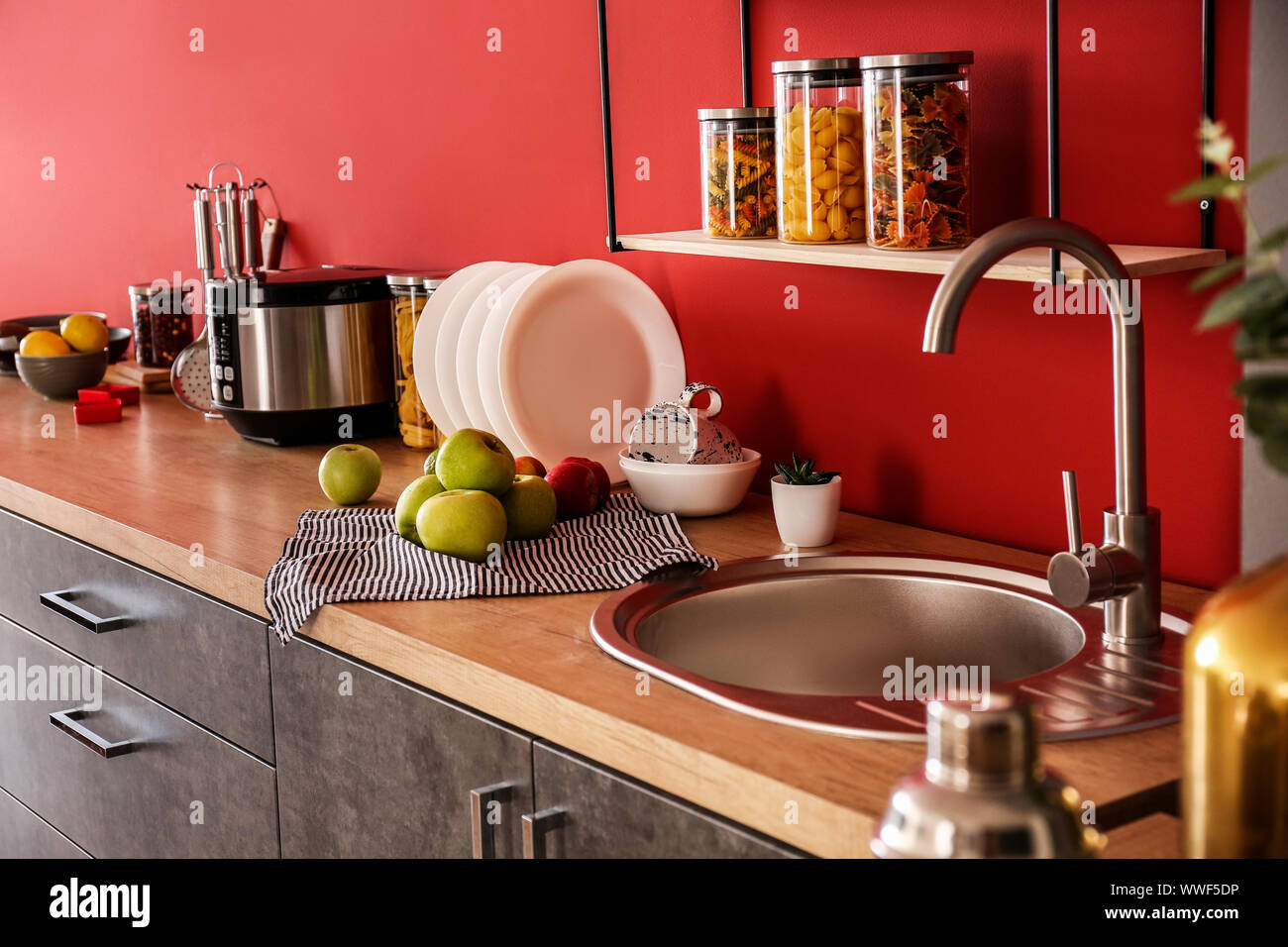 Counter with sink in interior of kitchen Stock Photo - Alamy