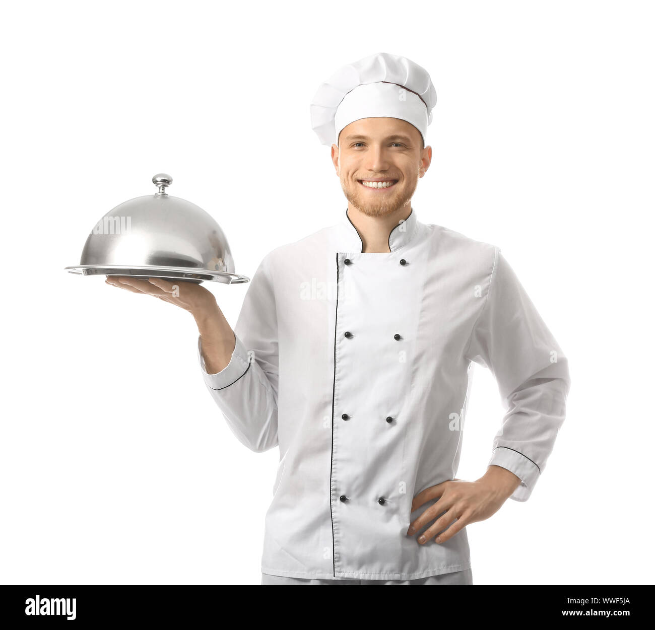 Handsome male chef with tray and cloche on white background Stock Photo ...