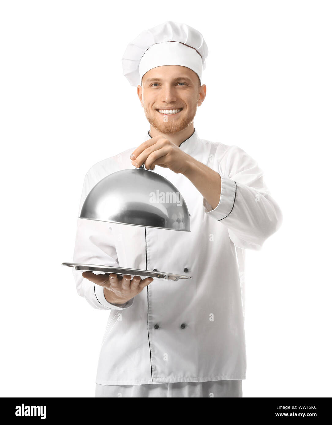 Handsome male chef with tray and cloche on white background Stock Photo ...