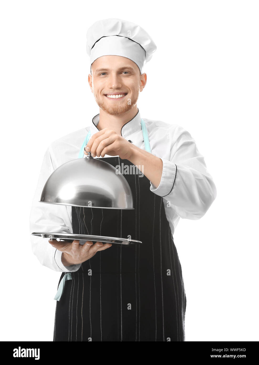 Handsome male chef with tray and cloche on white background Stock Photo ...