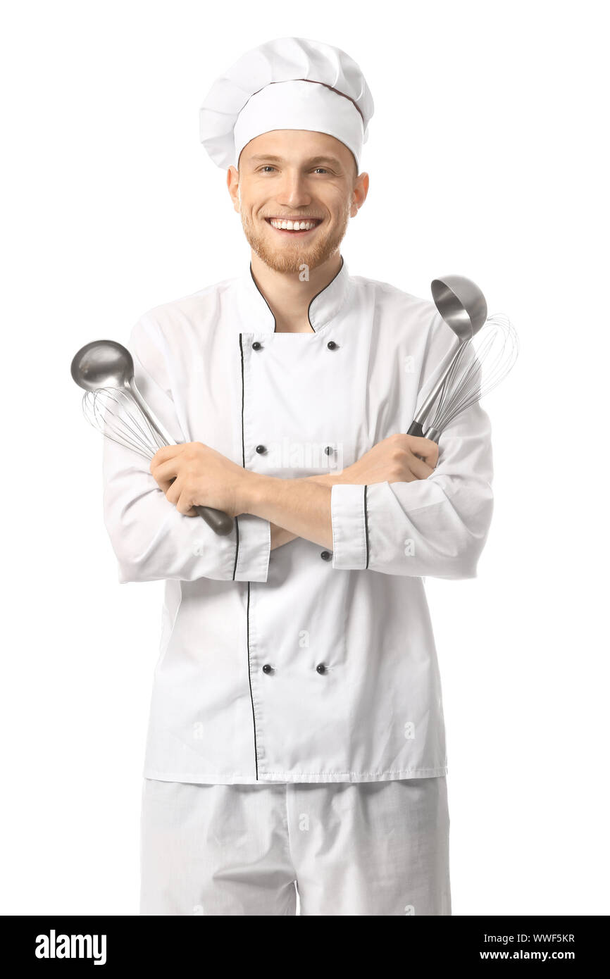 Handsome male chef with kitchenware on white background Stock Photo - Alamy