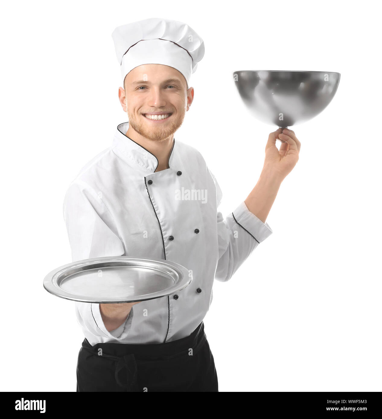Handsome male chef with tray and cloche on white background Stock Photo ...