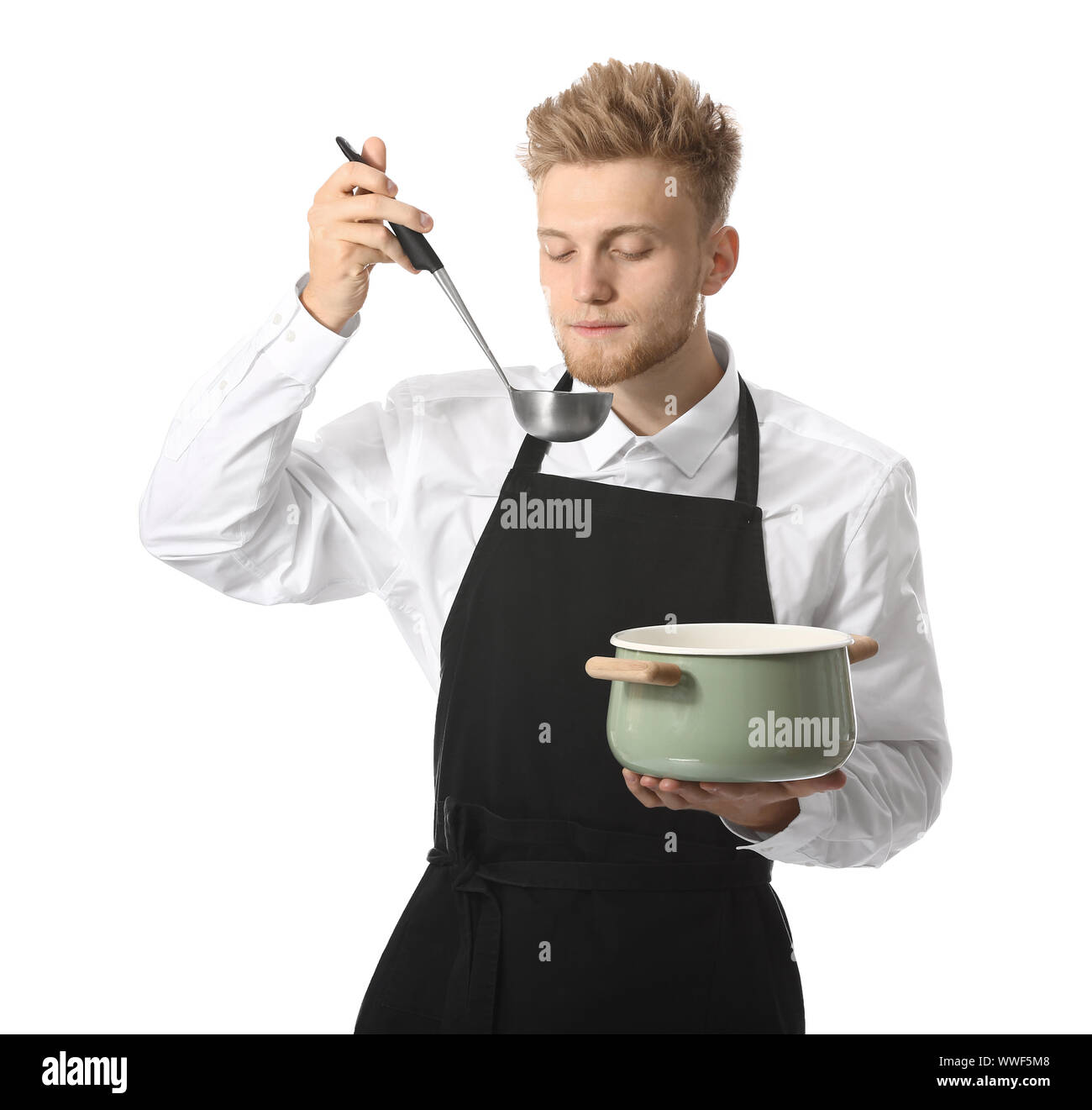 Handsome male chef with soup on white background Stock Photo - Alamy