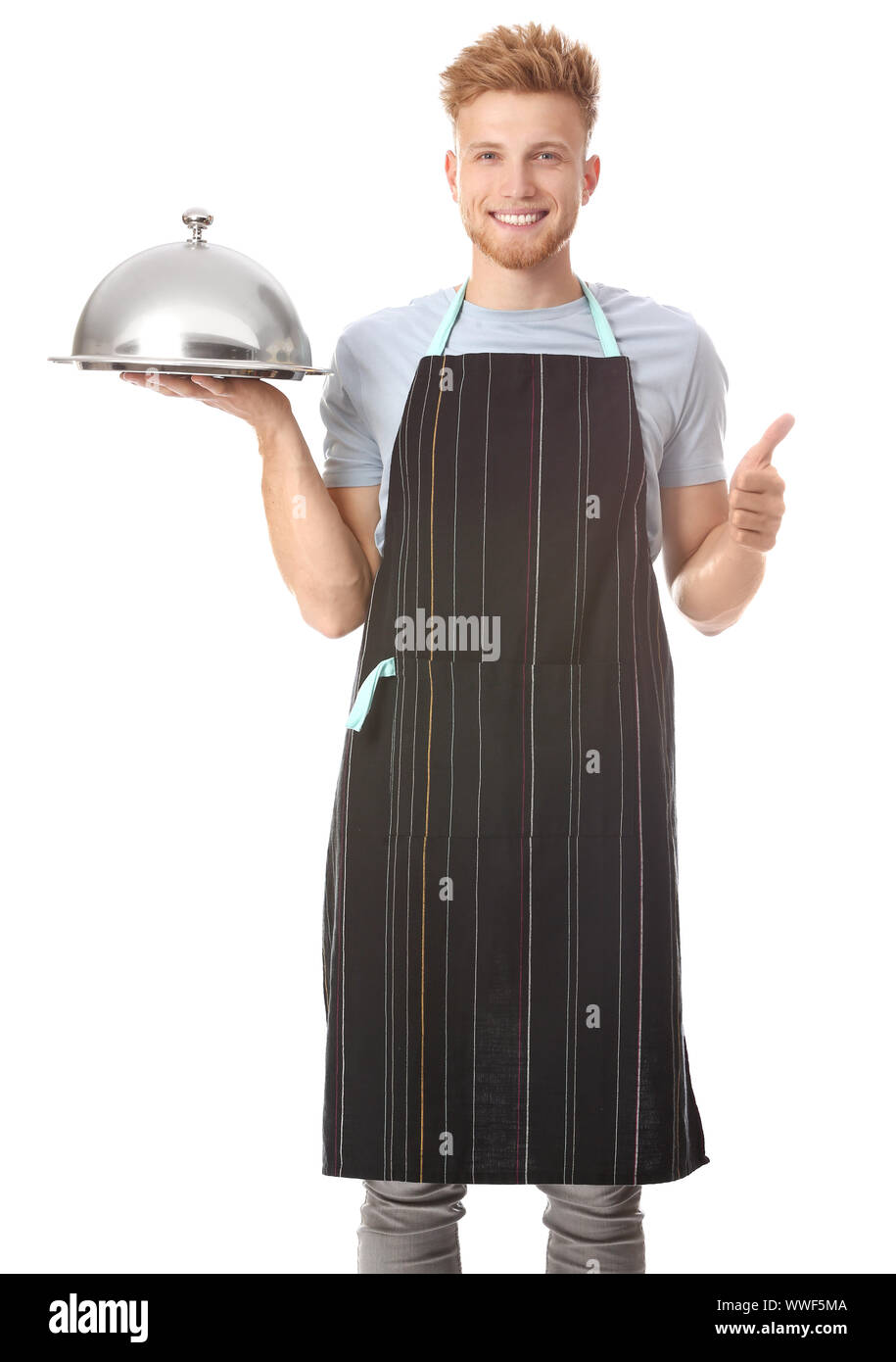 Handsome male chef with tray and cloche on white background Stock Photo ...