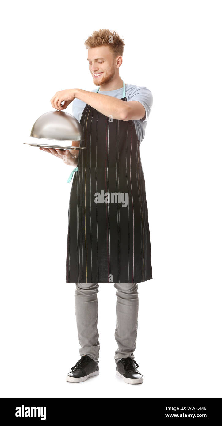 Handsome male chef with tray and cloche on white background Stock Photo ...