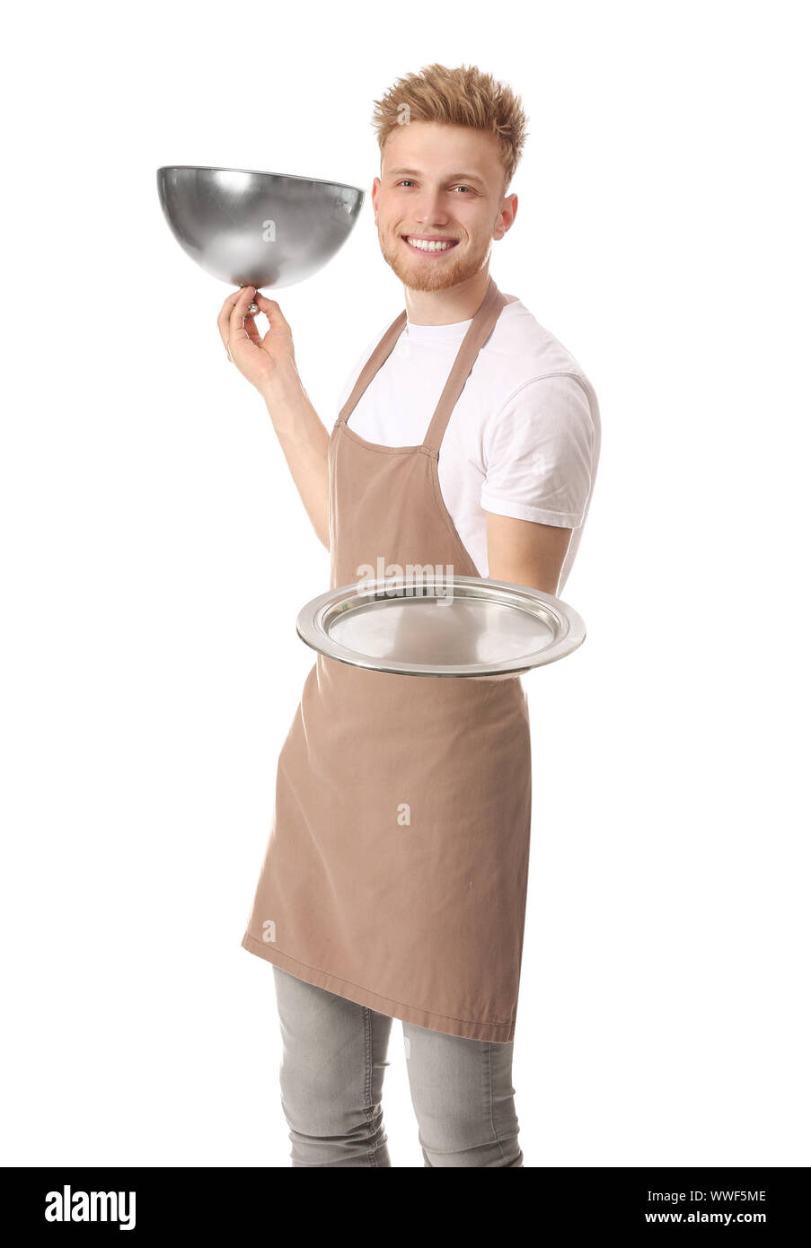 Handsome male chef with tray and cloche on white background Stock Photo ...