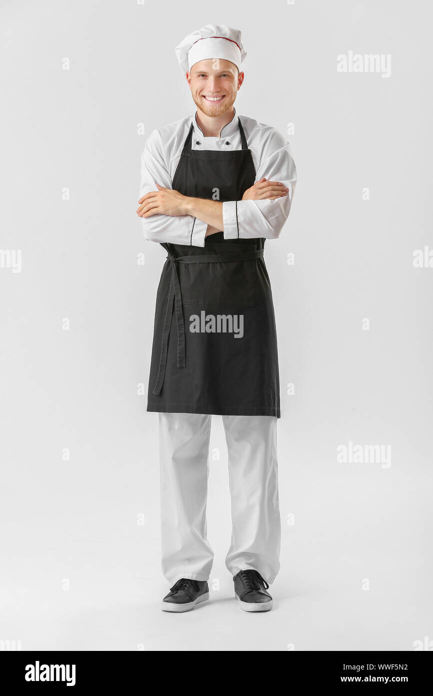 Handsome male chef on white background Stock Photo - Alamy