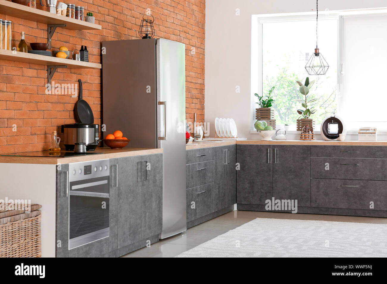 Interior of modern comfortable kitchen Stock Photo - Alamy