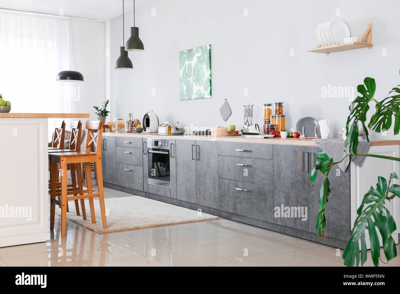 Interior of modern comfortable kitchen Stock Photo - Alamy