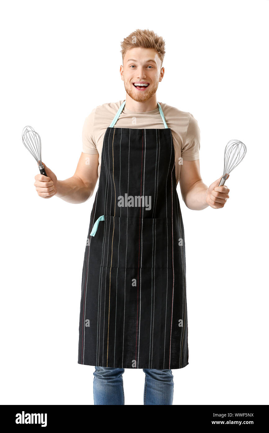 Handsome male chef with whisks on white background Stock Photo - Alamy