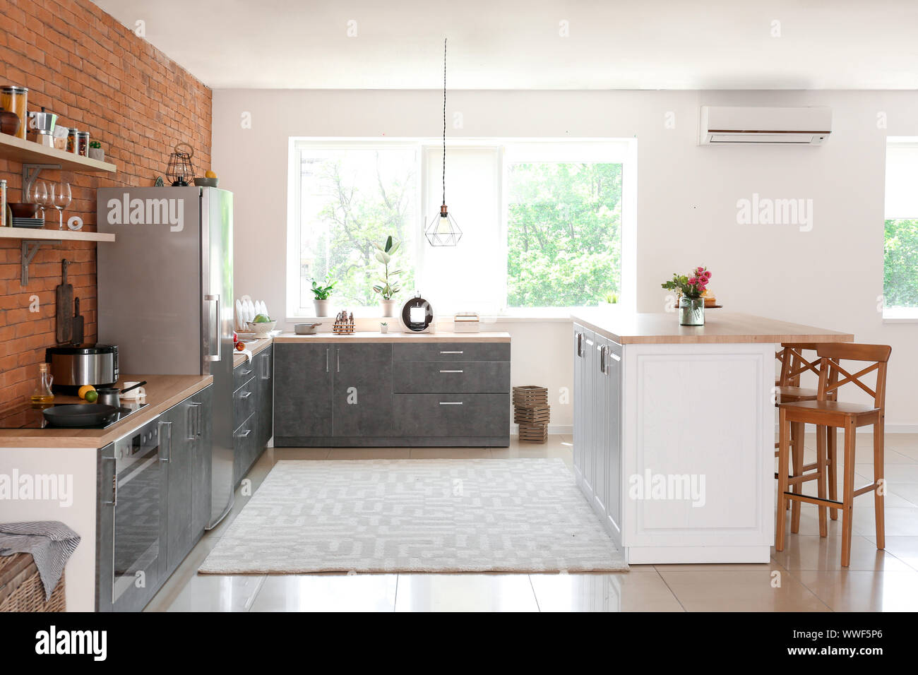 Interior of modern comfortable kitchen Stock Photo - Alamy