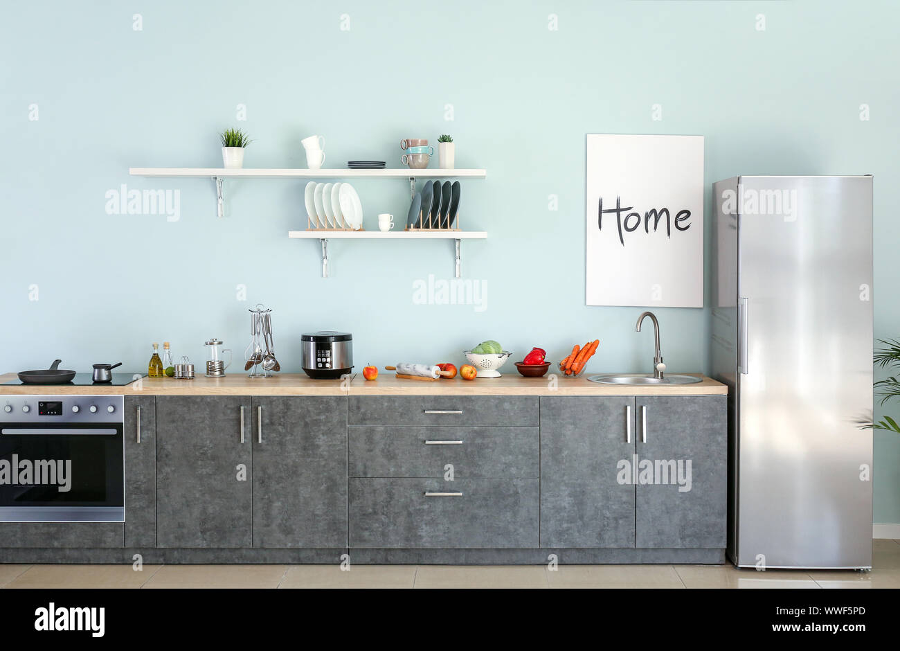 Interior of modern comfortable kitchen Stock Photo - Alamy