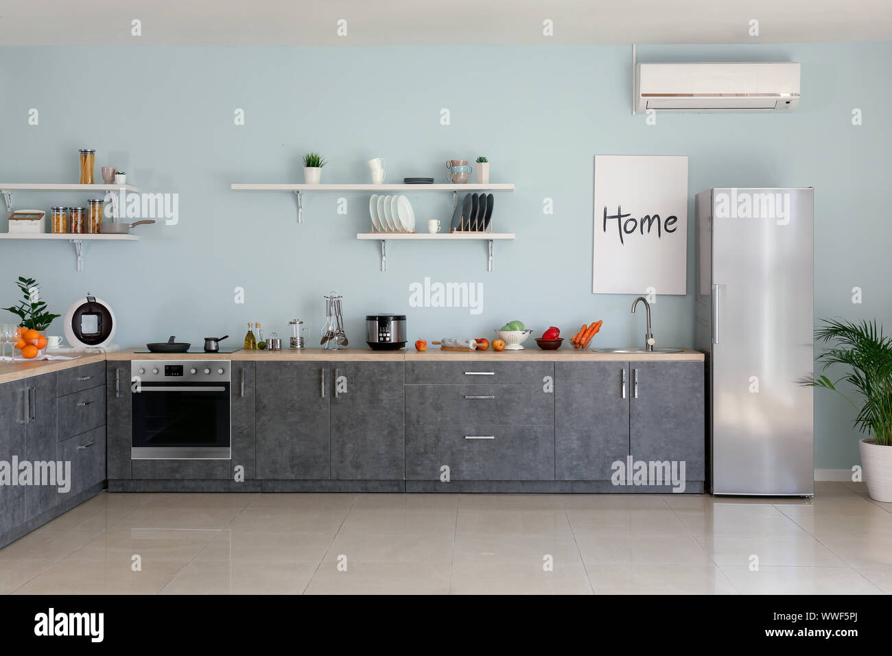 Interior of modern comfortable kitchen Stock Photo - Alamy