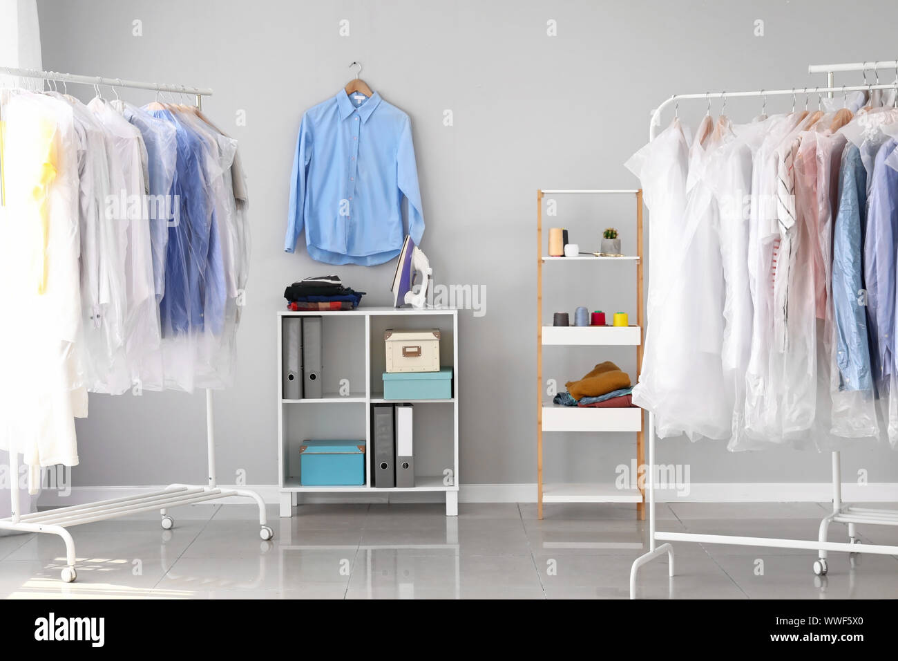 Interior of modern dry-cleaner's Stock Photo - Alamy