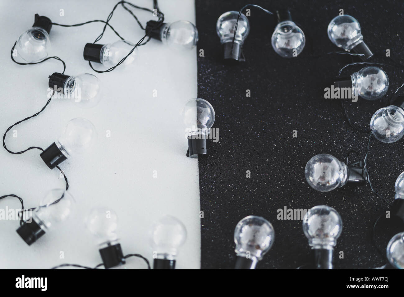 unconventional ideas concept, unique lightbulb globe centered in the ...