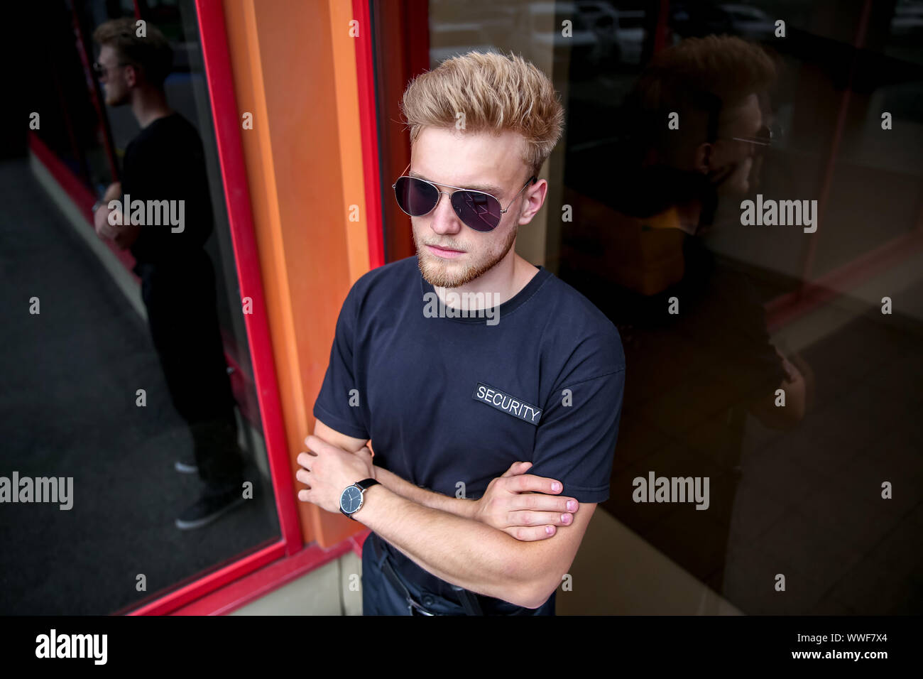 Handsome male security guard outdoors Stock Photo - Alamy