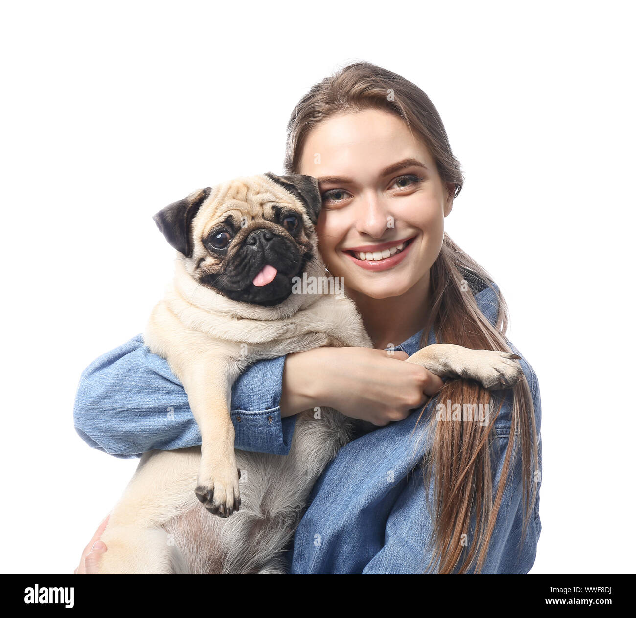 Beautiful young woman with cute pug dog on white background Stock Photo ...