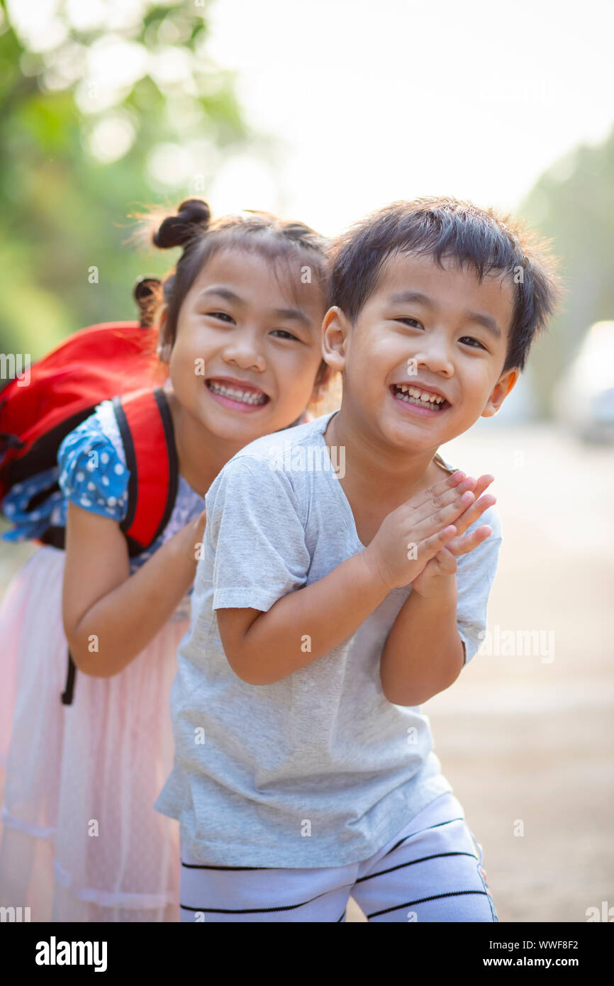 two lovely asian children boy and girl with kidding smiling face Stock ...