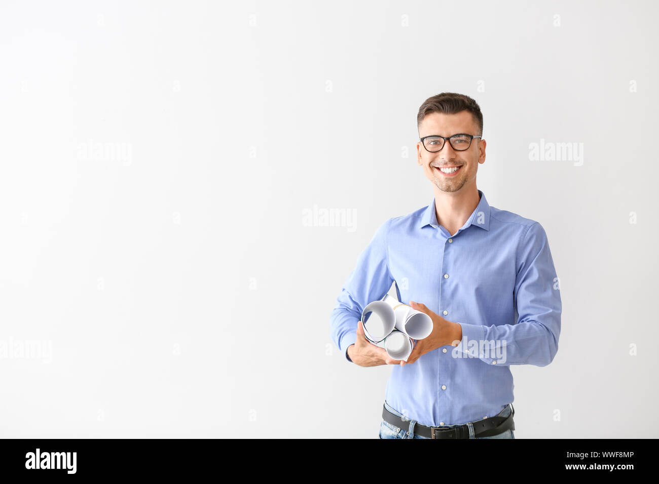 Handsome male architect on white background Stock Photo - Alamy