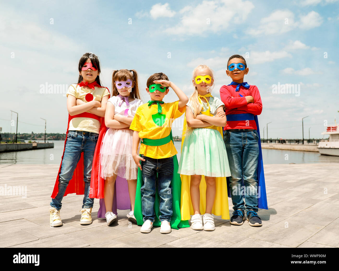 Cute little children dressed as superheroes outdoors Stock Photo - Alamy