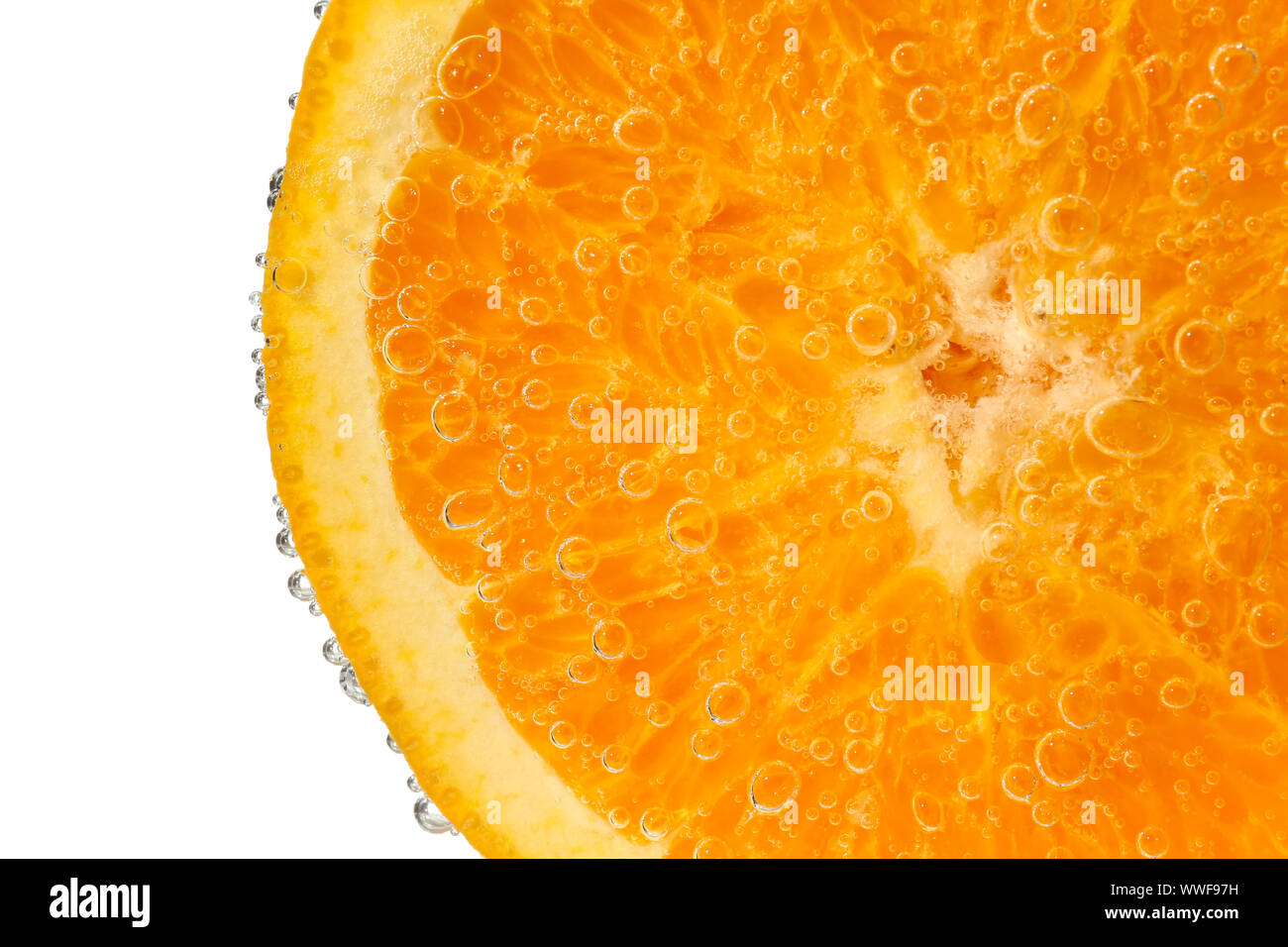 Ripe orange slice in water against white background, closeup Stock ...