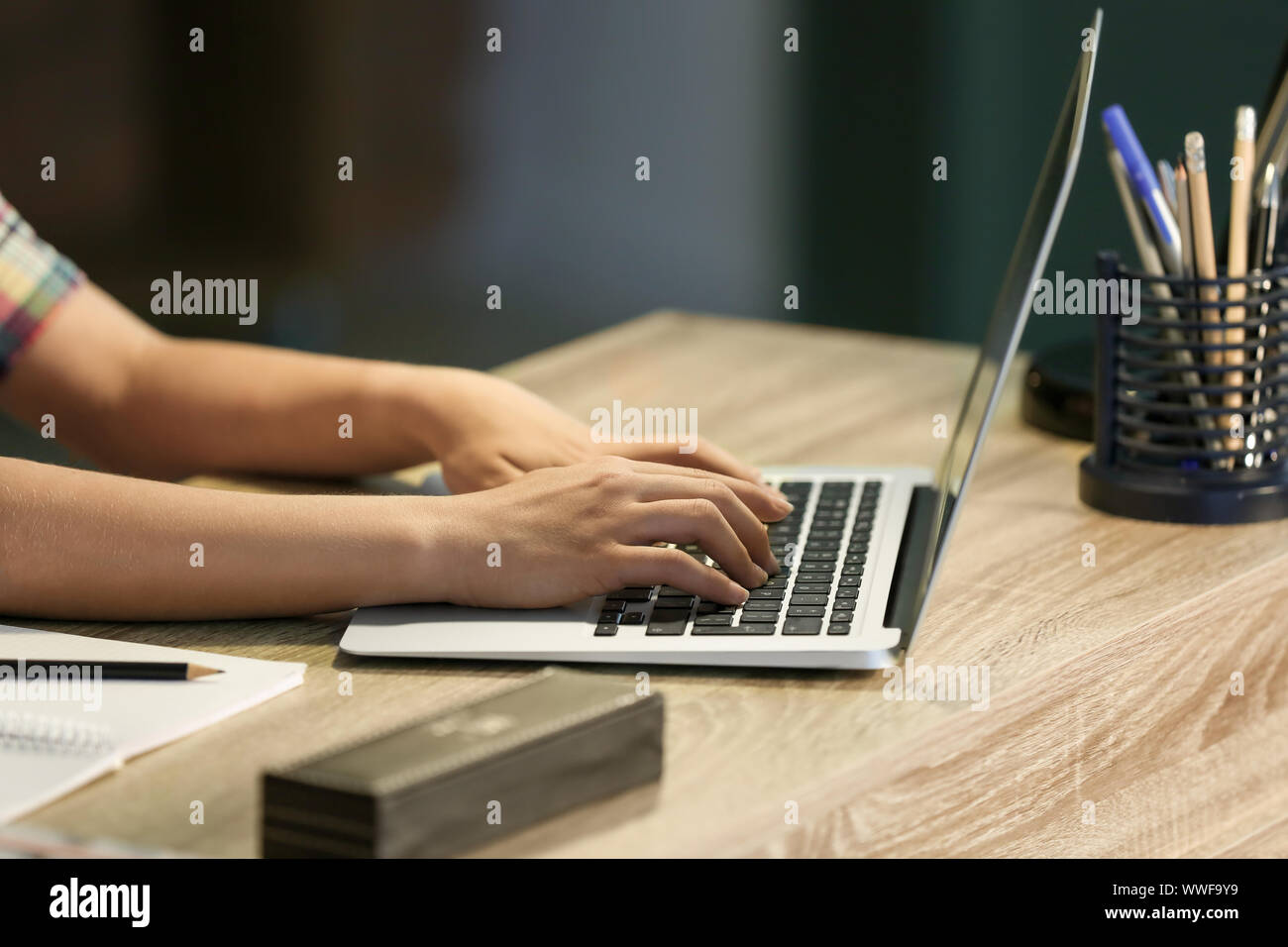 Teenage girl doing homework late in evening Stock Photo - Alamy