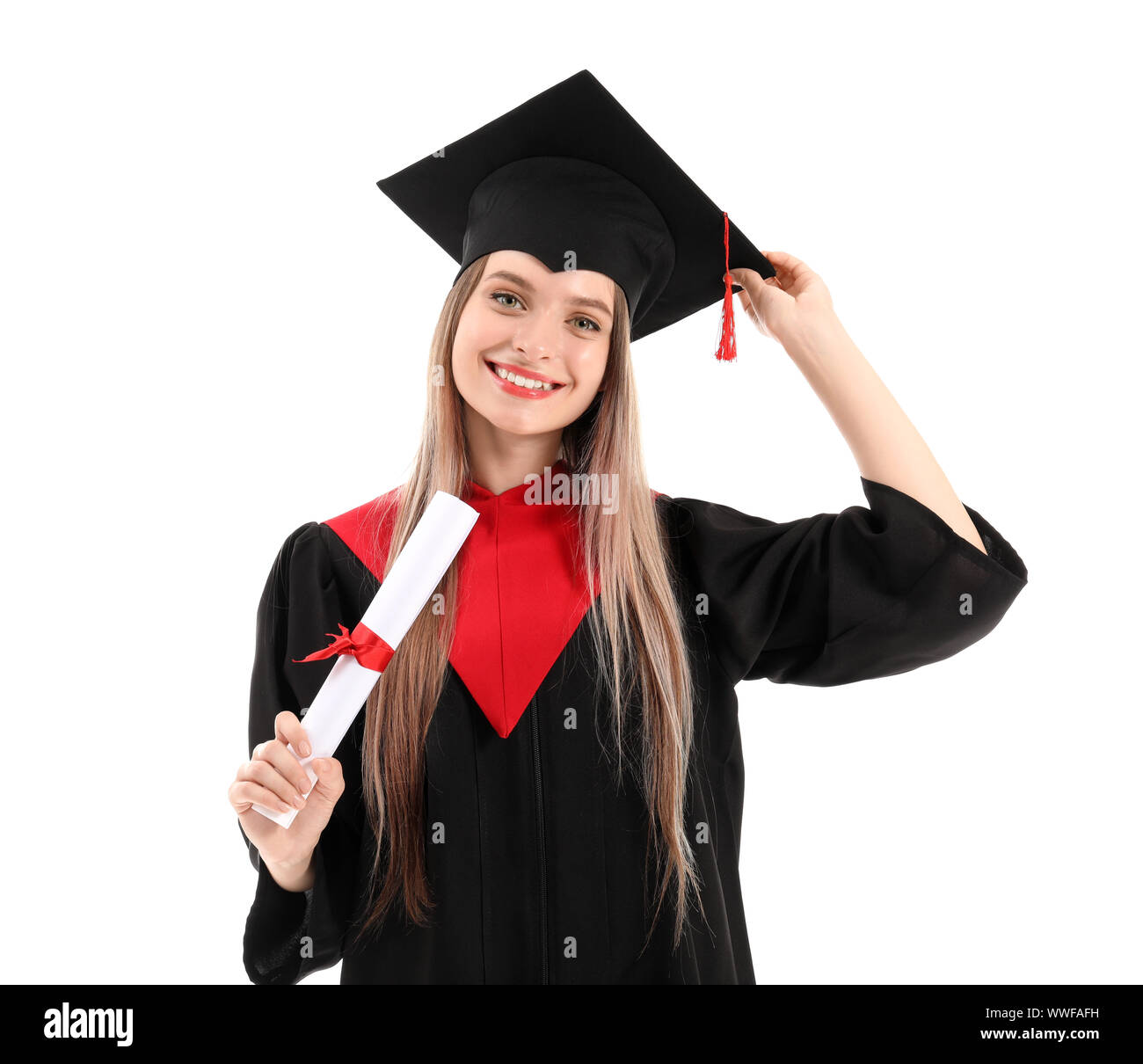 Young female student in bachelor robe and with diploma on white ...