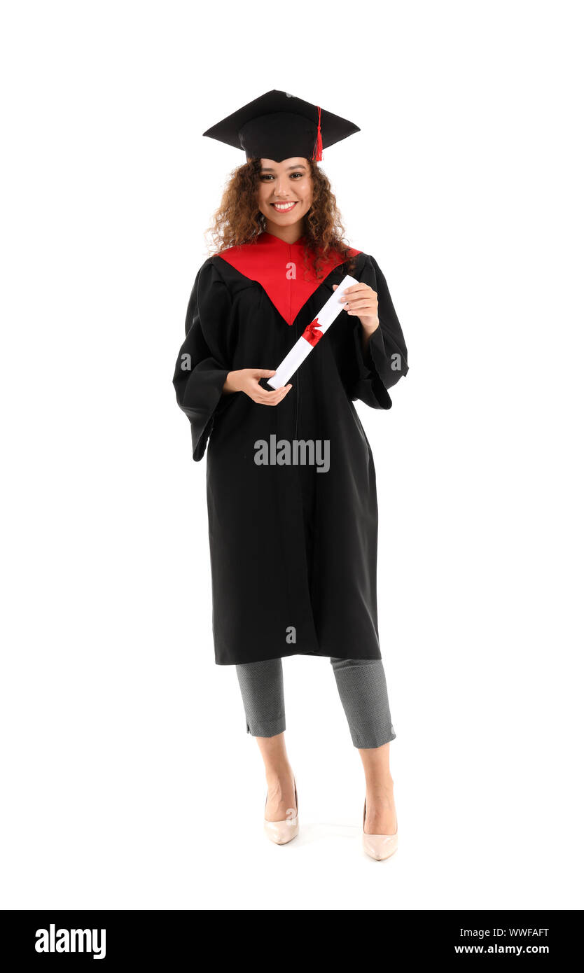 Young African-American student in bachelor robe and with diploma on ...