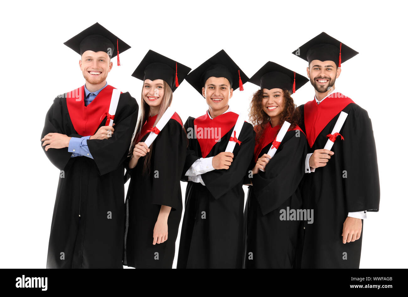 Young students in bachelor robes on white background Stock Photo - Alamy