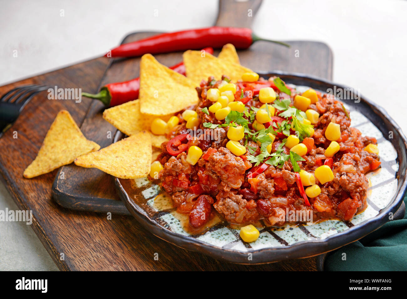 Tasty chili con carne on plate Stock Photo - Alamy