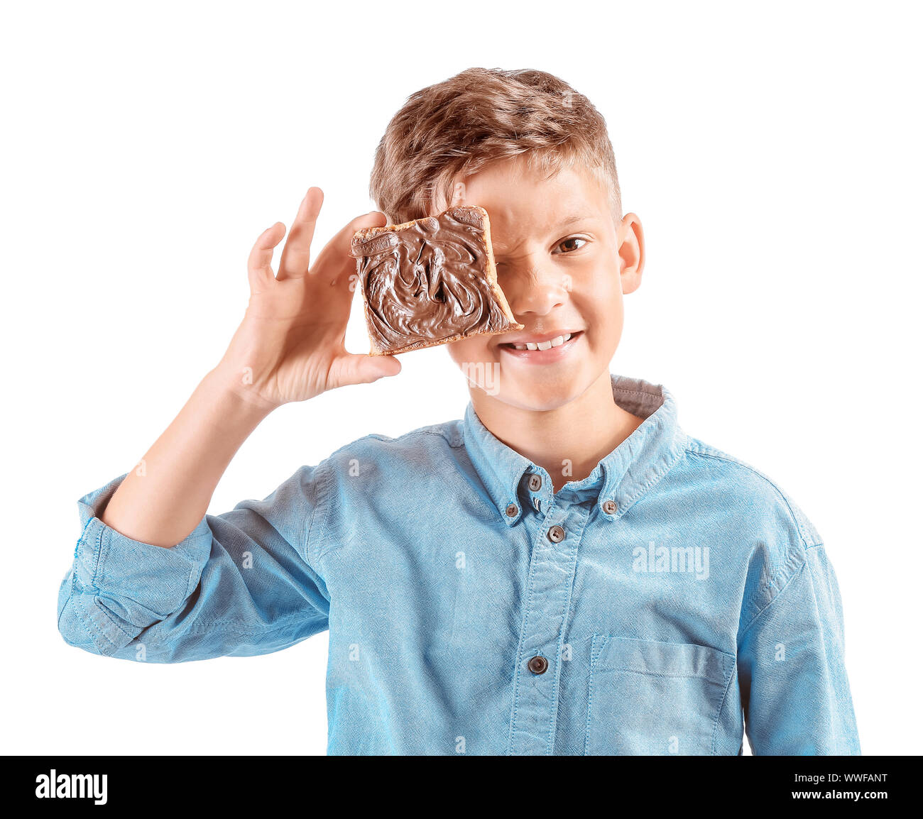 Funny little boy with tasty toast on white background Stock Photo - Alamy