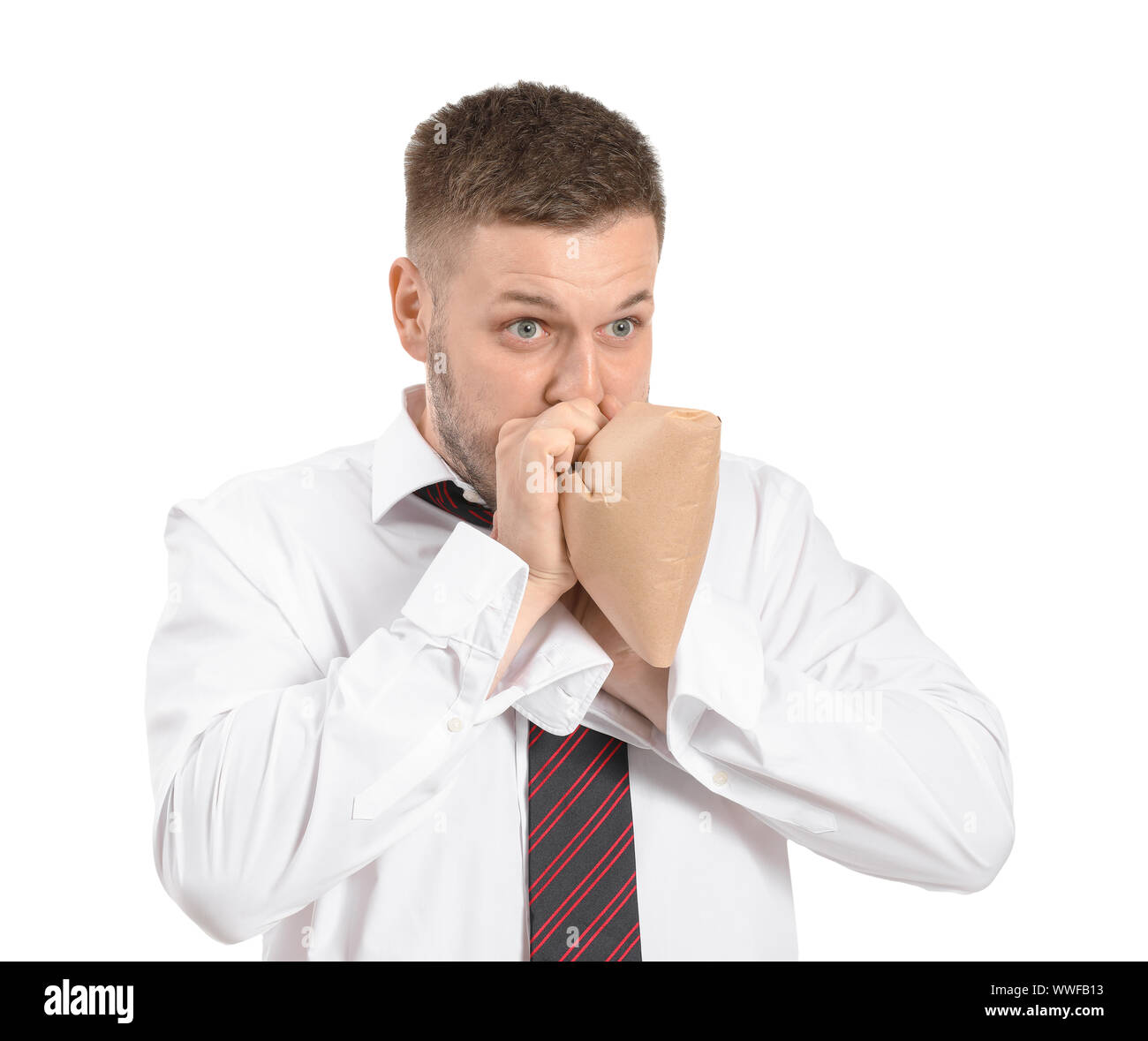 Businessman having panic attack on white background Stock Photo - Alamy
